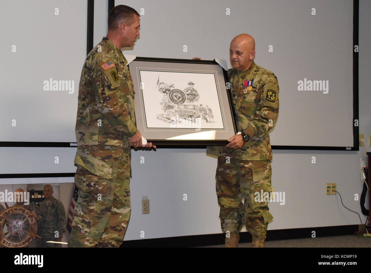 U.S. Army Col. Jody Dew is honored on the day of his retirement at a ...