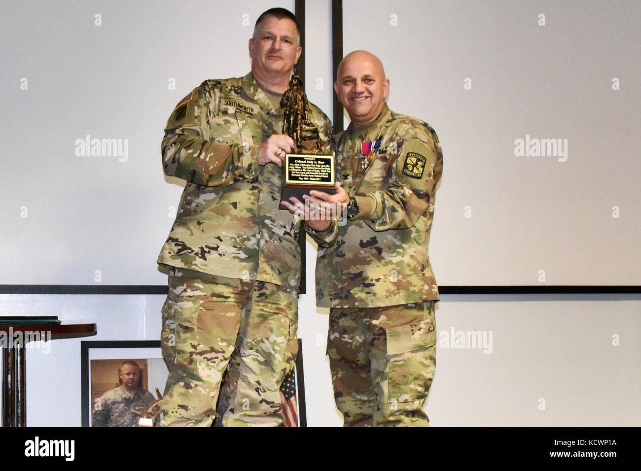 U.S. Army Col. Jody Dew is honored on the day of his retirement at a ...