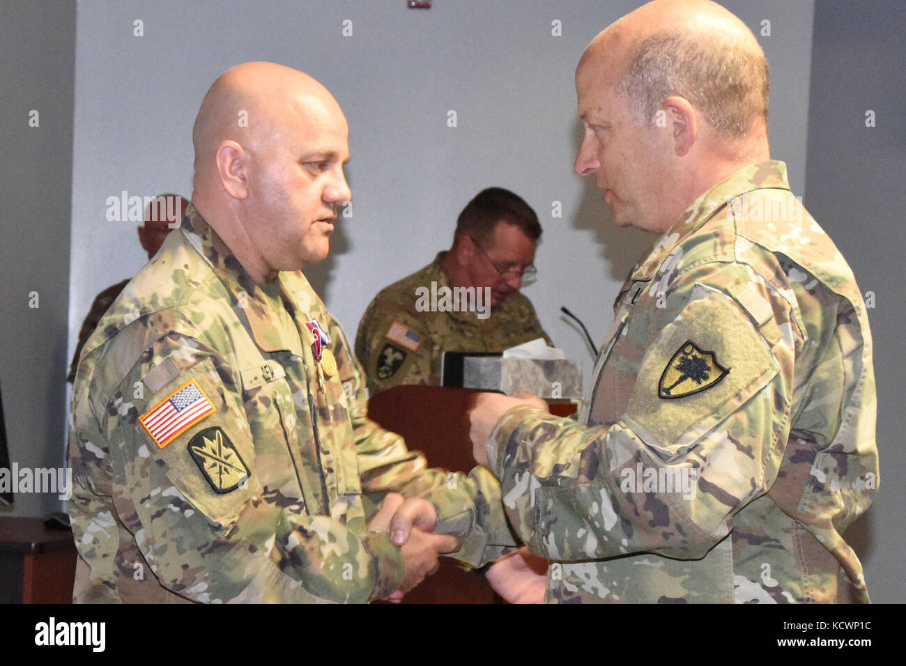 U.S. Army Col. Jody Dew is honored on the day of his retirement at a ...