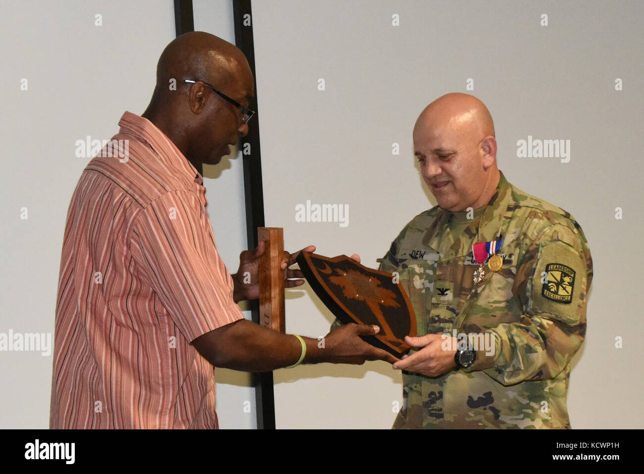 U.S. Army Col. Jody Dew is honored on the day of his retirement at a ...