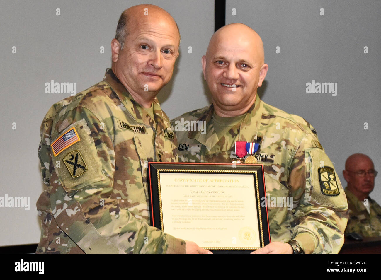 U.S. Army Col. Jody Dew is honored on the day of his retirement at a ...