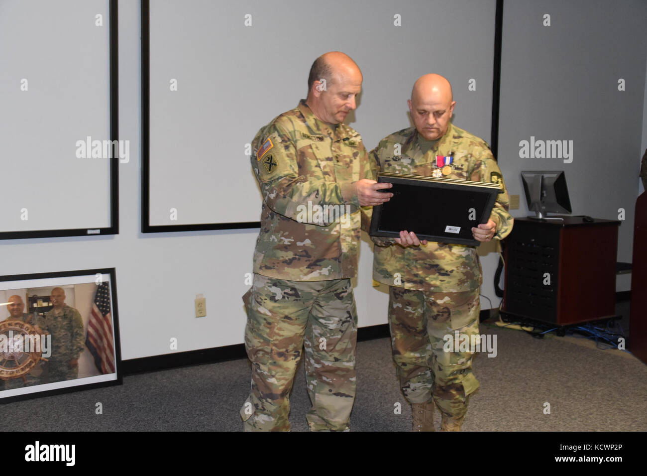 U.S. Army Col. Jody Dew is honored on the day of his retirement at a ...