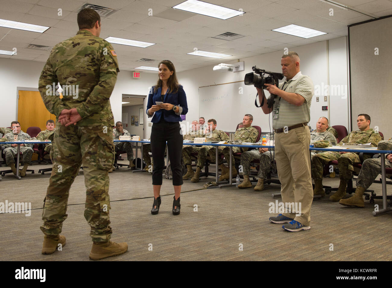 U.S. Army Capt. Jessica Donnelly and Sgt. Brian Calhoun, 108th Public ...