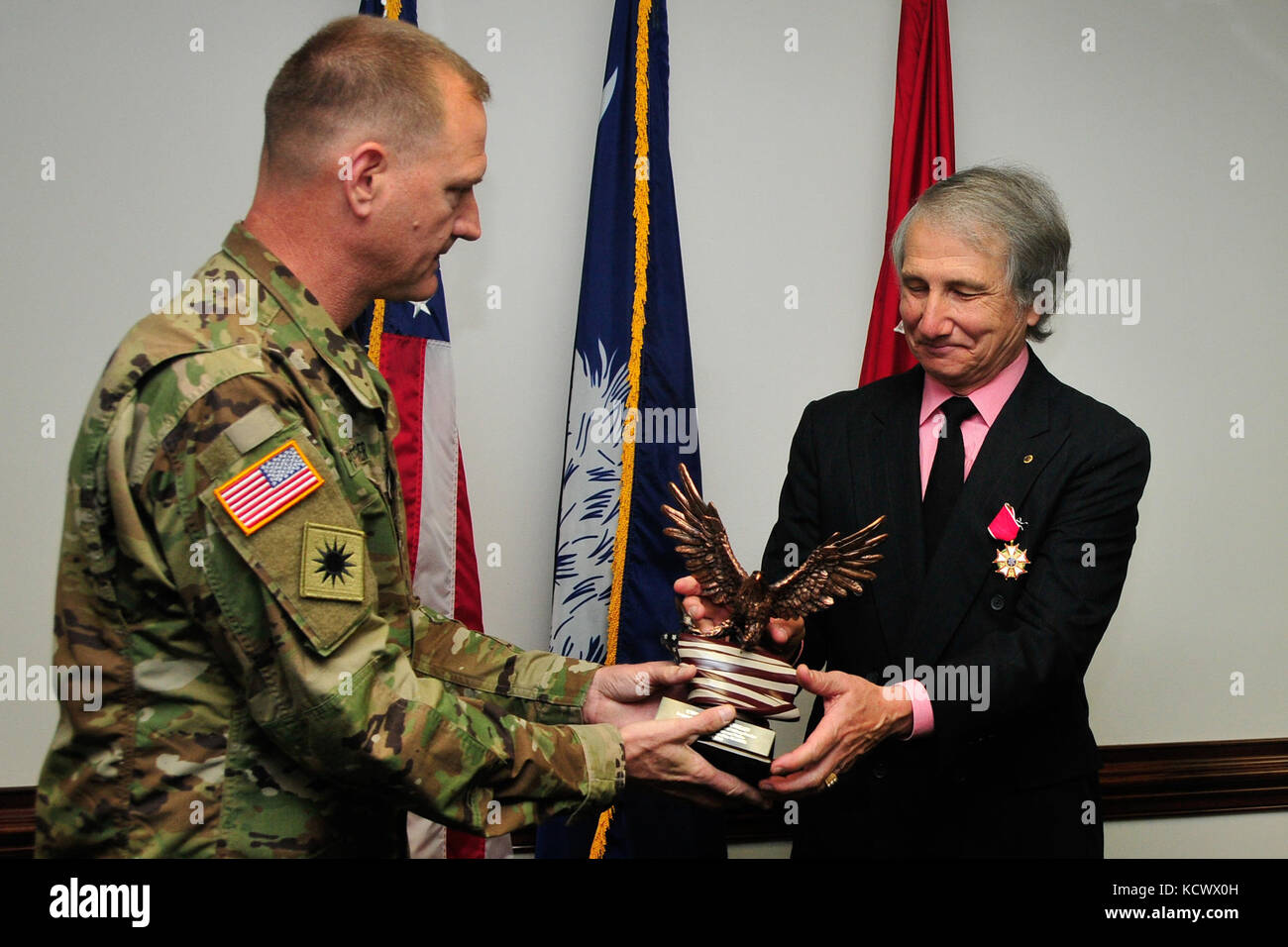 U.S. Army Chief Warrant Officer 5 Kent Puffenbarger presents Chief ...