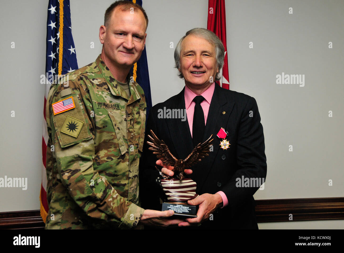 U.S. Army Chief Warrant Officer 5 Kent Puffenbarger presents Chief ...