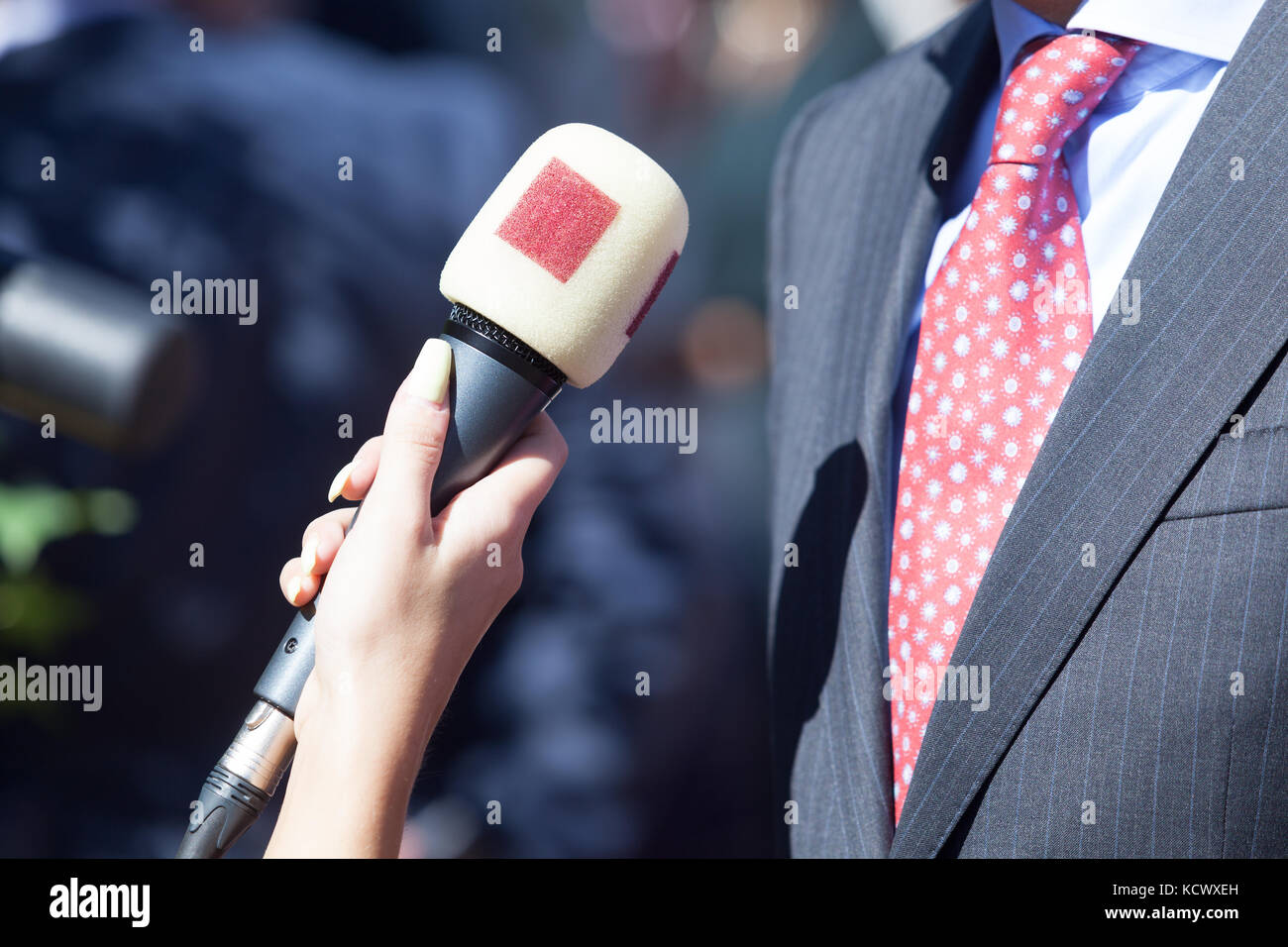 Interviewer asking question hi-res stock photography and images - Alamy