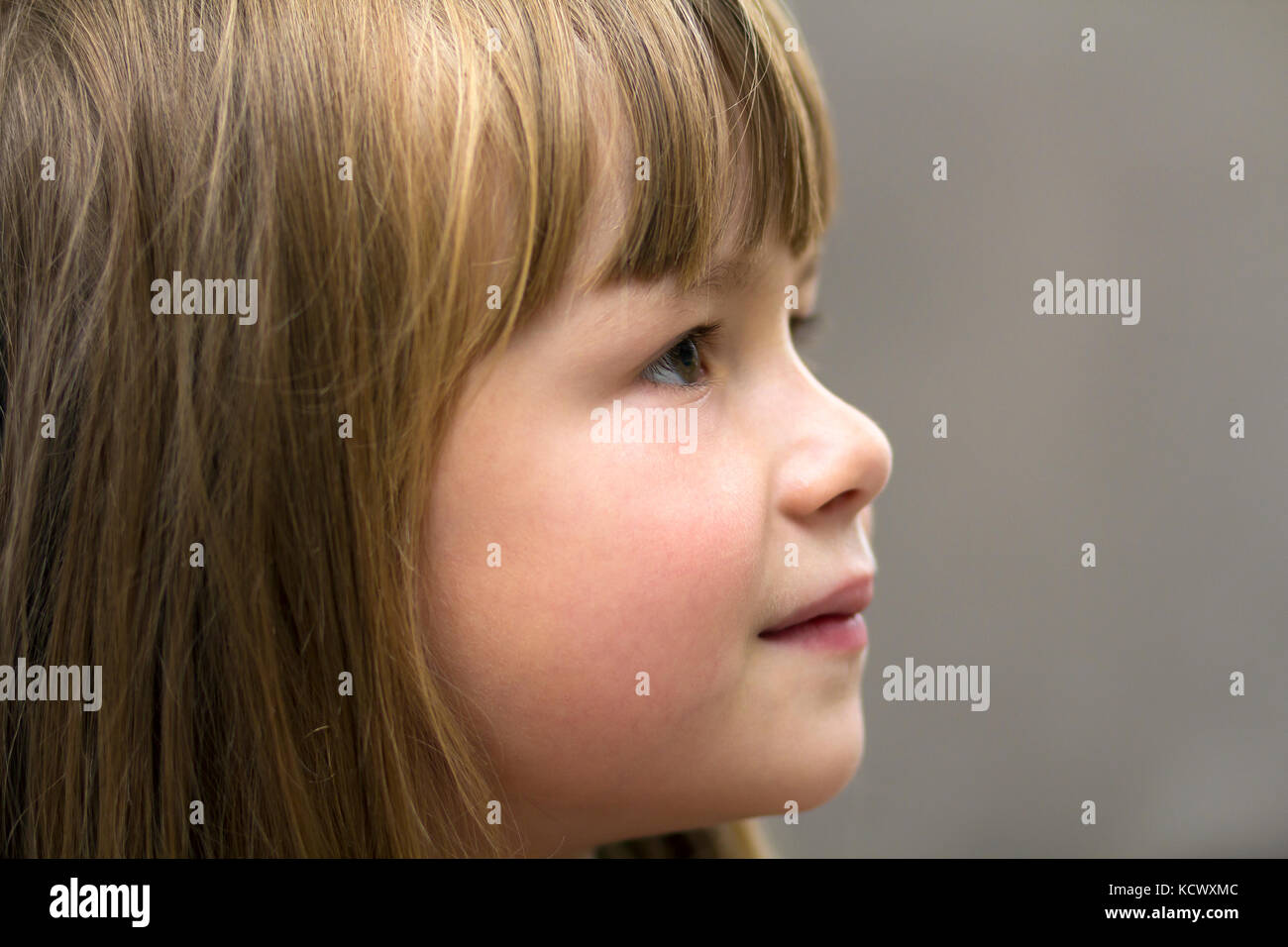 Close-up portrait of pretty little girl. Smiling child Stock Photo - Alamy