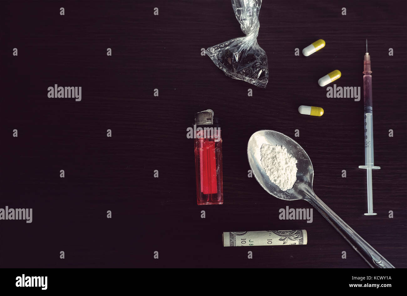 Different types of drugs are on the black table. Top view with copy ...