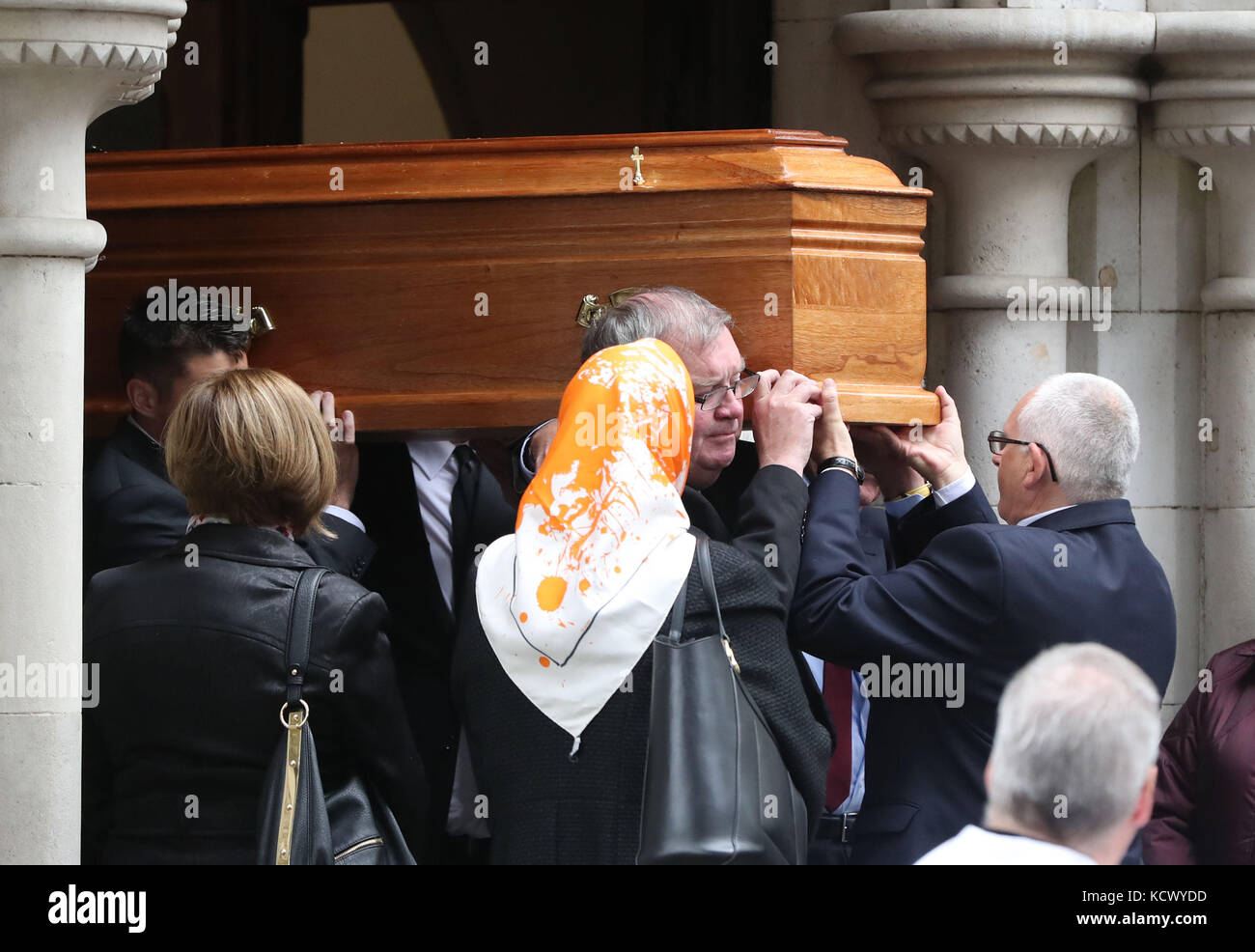 The coffin of former Irish taoiseach Liam Cosgrave is carried into the ...