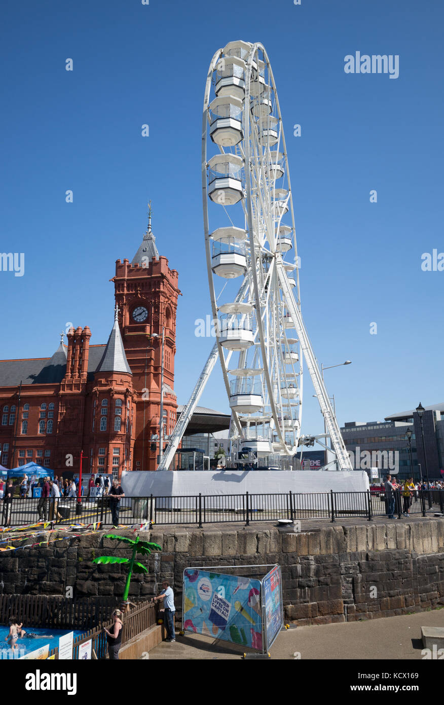 Pierhead Building and Ferris Wheel on former docks, with tourists ...