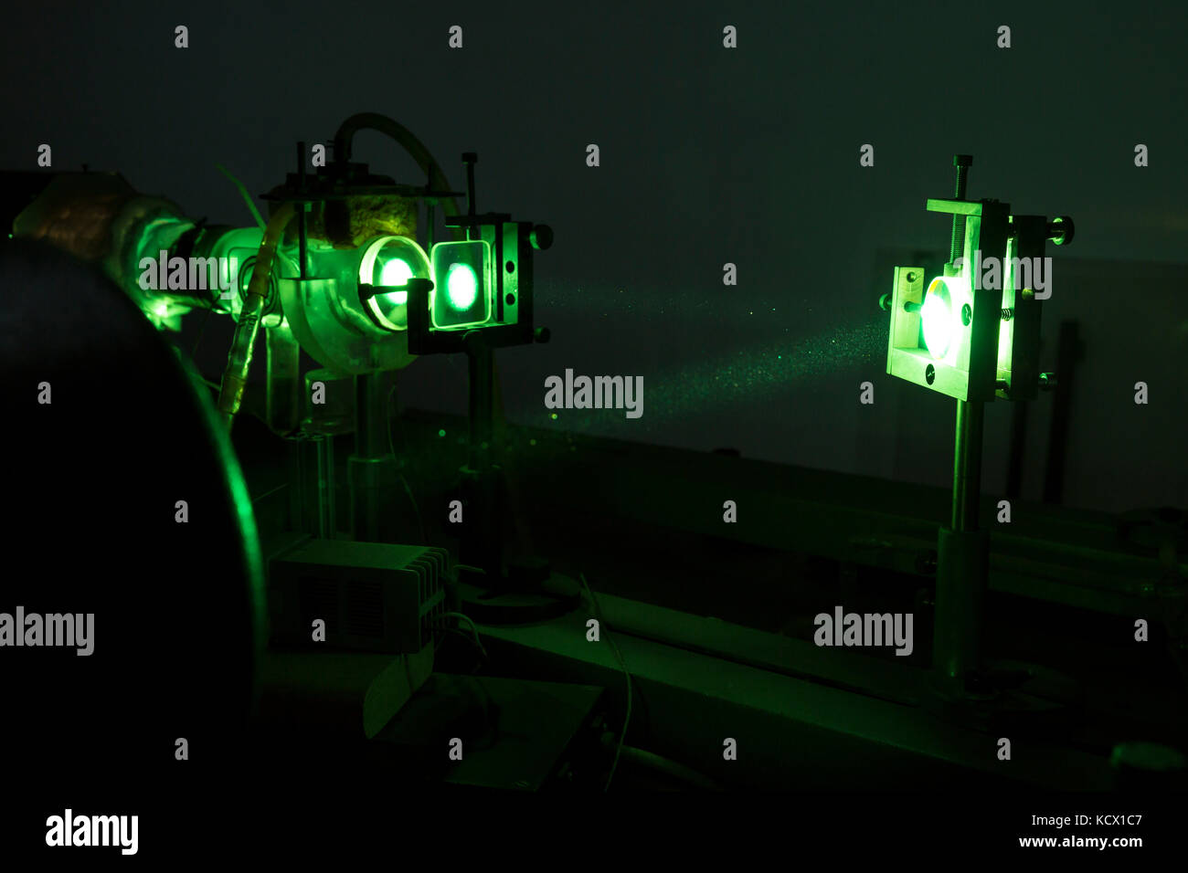 Powerful industrial green laser equipment in a laboratory for physics ...