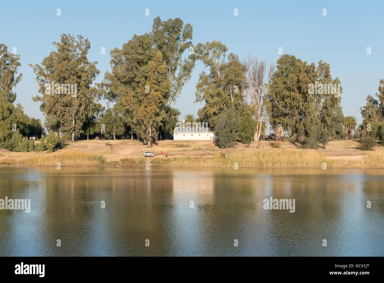 UPINGTON, SOUTH AFRICA - JULY 6, 2017: Two anglers at Die Eiland (the ...
