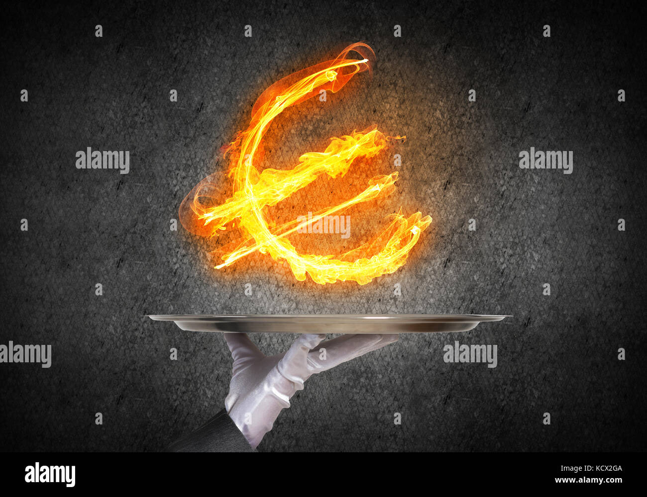 Hand of waitress presenting flaming euro sign Stock Photo - Alamy