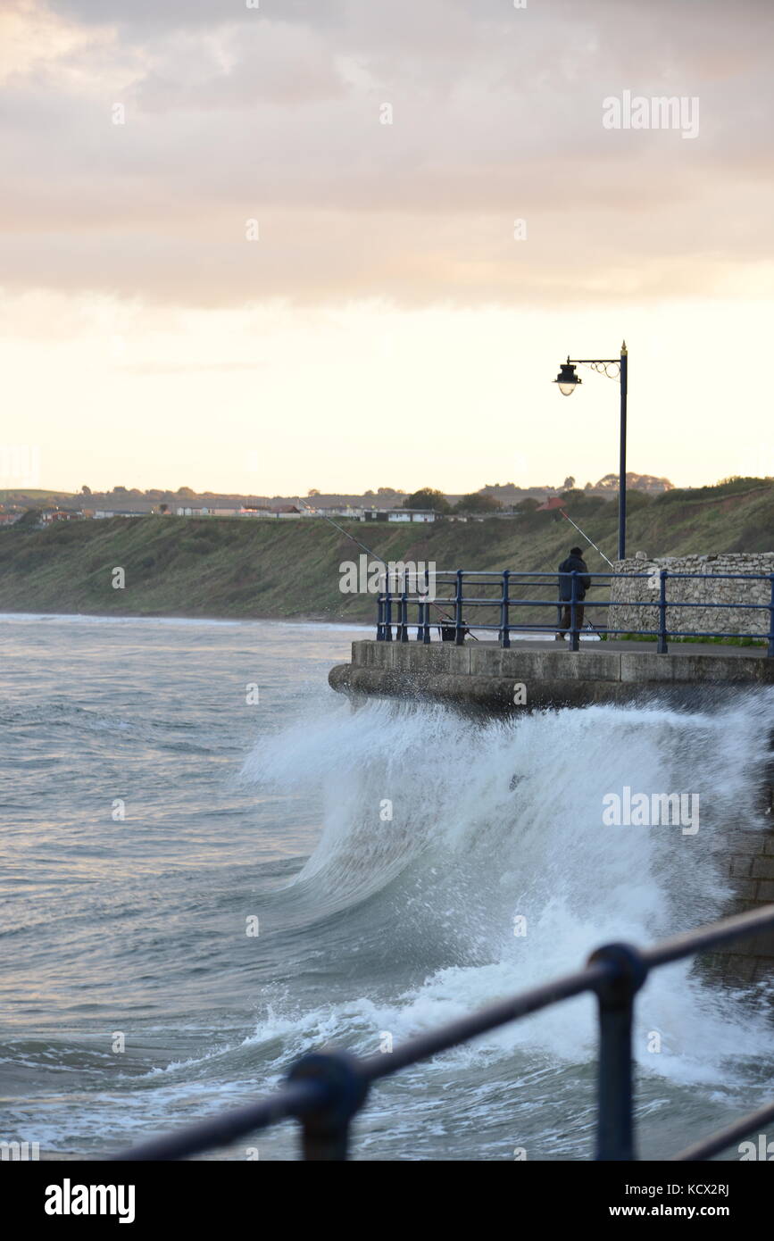 Waves crashing into sea defences, Filey, North Yorkshire UK Stock Photo ...