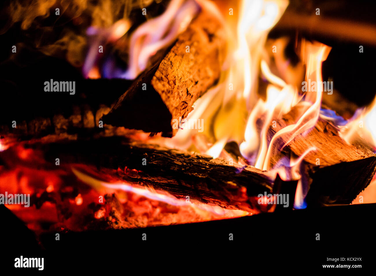 Image of burning logs hi-res stock photography and images - Alamy