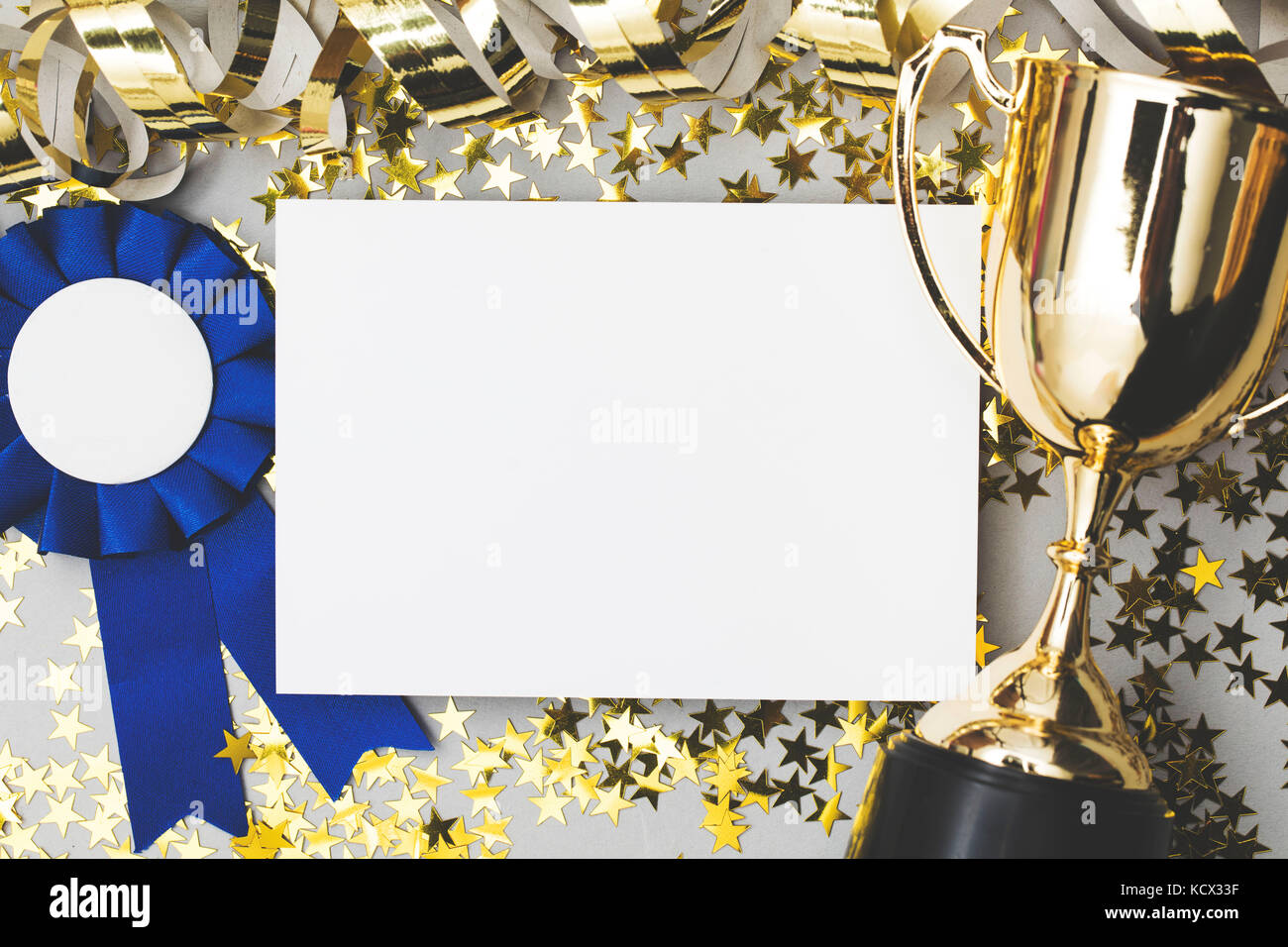 Winners background with trophy and rosette Stock Photo - Alamy