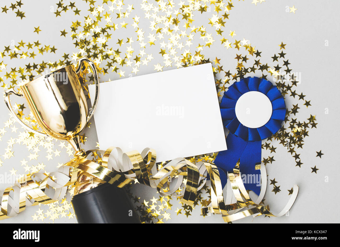 Winners background with trophy and rosette Stock Photo - Alamy