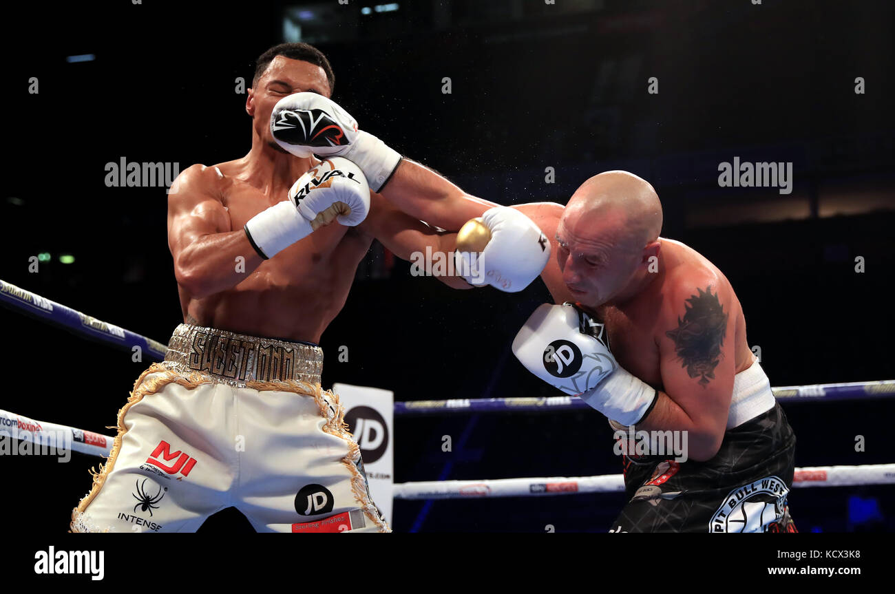 Marcus Morrison (left) in action against Mariusz Biskupski during their ...