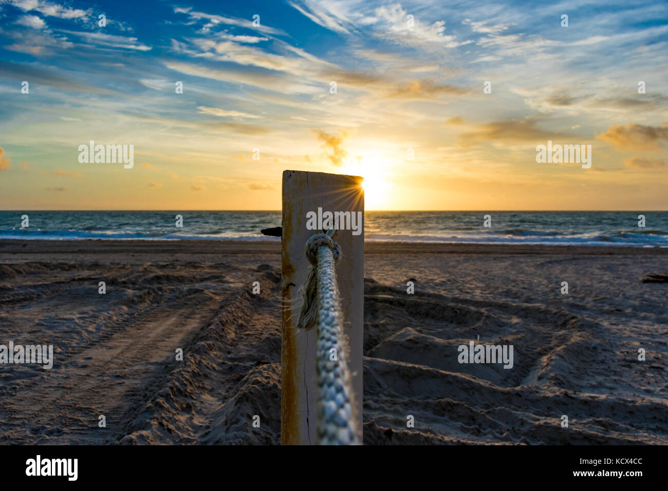 rope and post on the beach on a bright sunny morning Stock Photo - Alamy