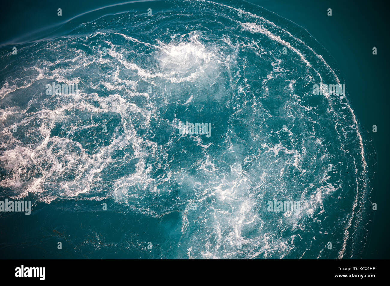 water splashing in blue sea Stock Photo - Alamy