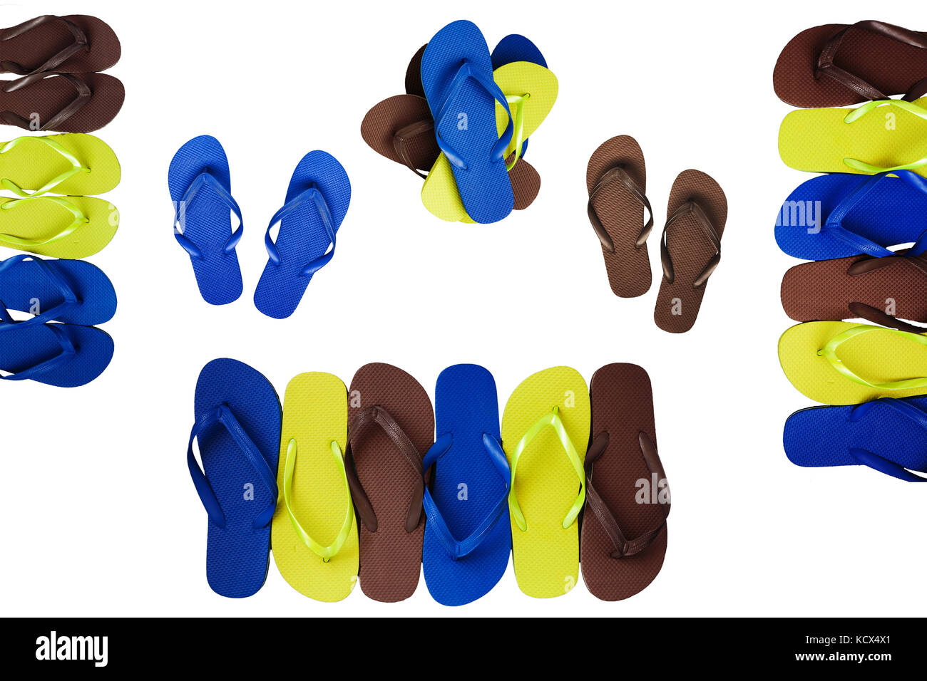 Several pairs of multi-colored rubber flip-flops exhibited in a row ...
