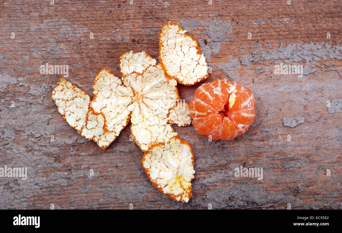 picture of a Peeled Slices of Orange on wood cement backgrounds, group ...