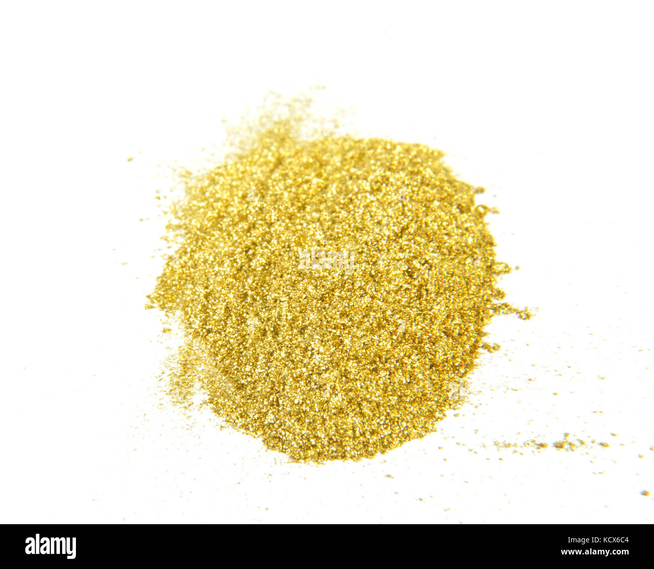 image of a gold glitter powder on white background Stock Photo - Alamy