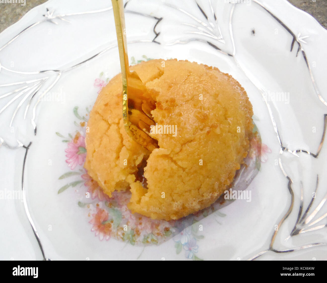 Picture of a Turkish dessert with syrup - Sekerpare Stock Photo - Alamy