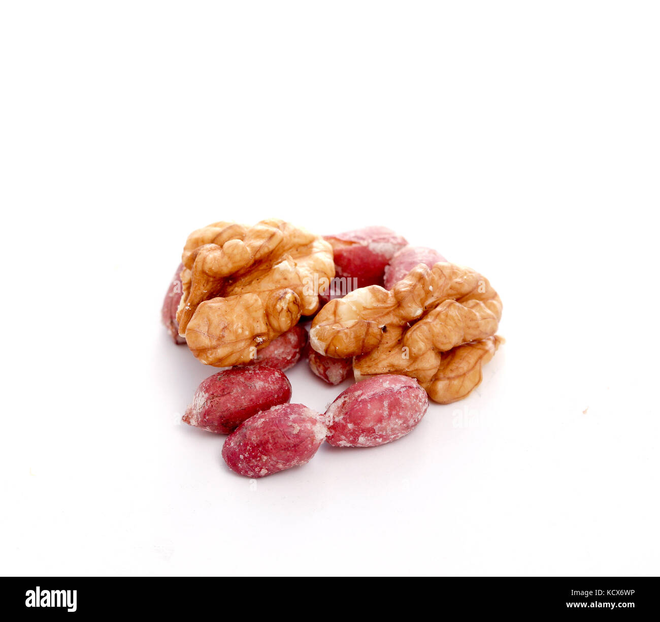 picture of a walnuts and peanuts isolated on a white background Stock ...