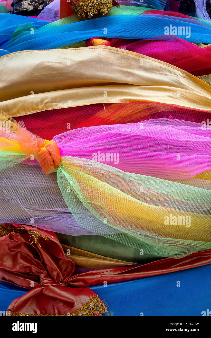 Sacred Tree wrapped with scarves as offering, in Wat Chedi Luang temple ...