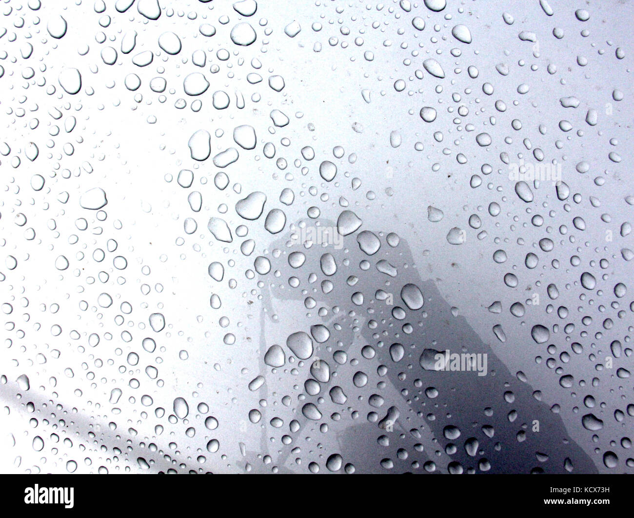picture of a water or rain drops on a car surface Stock Photo - Alamy