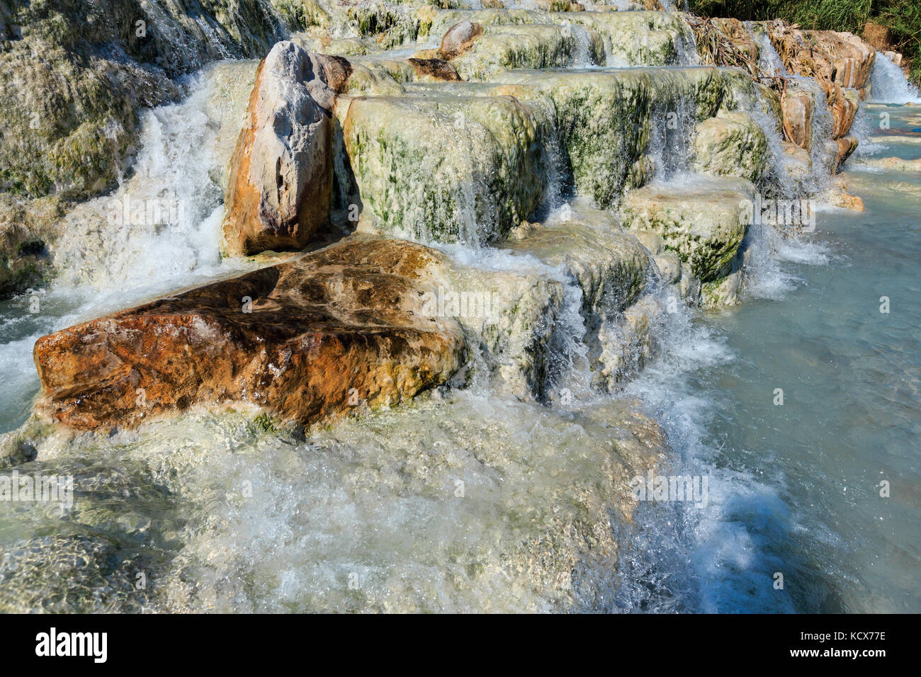 Natural spa with waterfalls and hot springs at Saturnia thermal baths ...