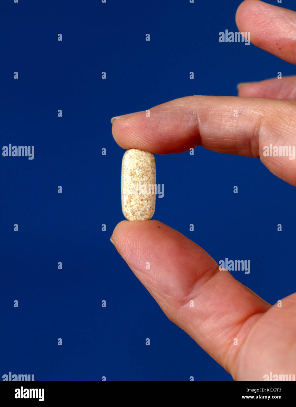 picture of a Pill, Tablet, Capsule on a fingers,health concept Stock ...