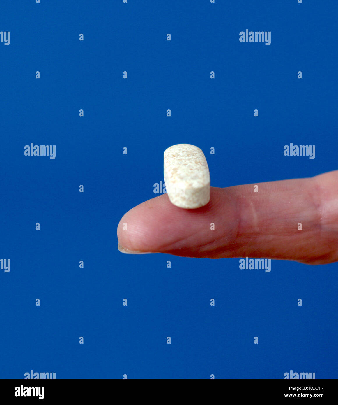 picture of a Pill, Tablet, Capsule on a fingers,health concept Stock ...