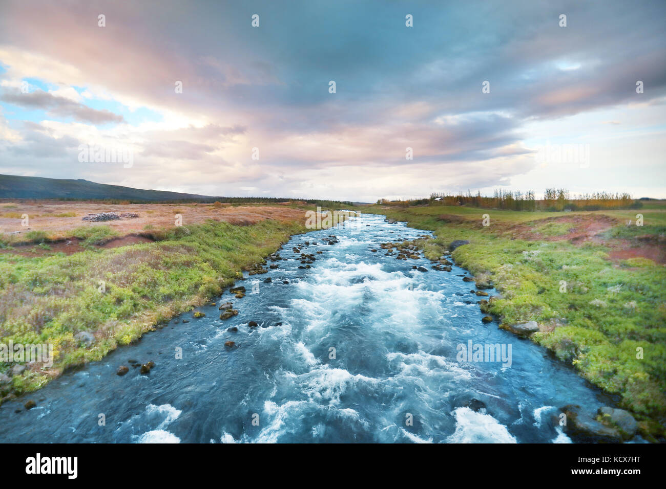 Blue mountain river with rocks in Iceland Stock Photo - Alamy