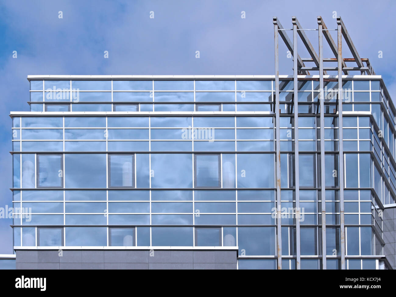 Modern building detail with blue glass facade Stock Photo - Alamy