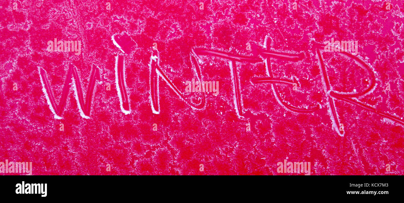 picture of a text winter on a frosty red metal surface Stock Photo - Alamy