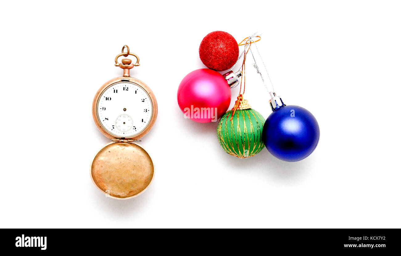 Christmas decoration with balls and vintage clock on white background ...
