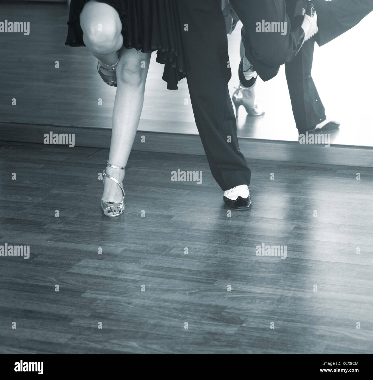 Ballroom dance couple of dancers and teachers in studio school dancing ...
