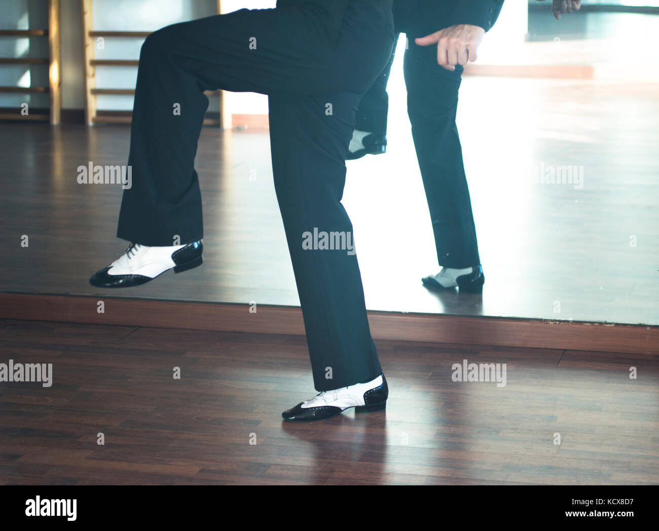 Ballroom dance male dancer and teacher in studio school dancing in ...