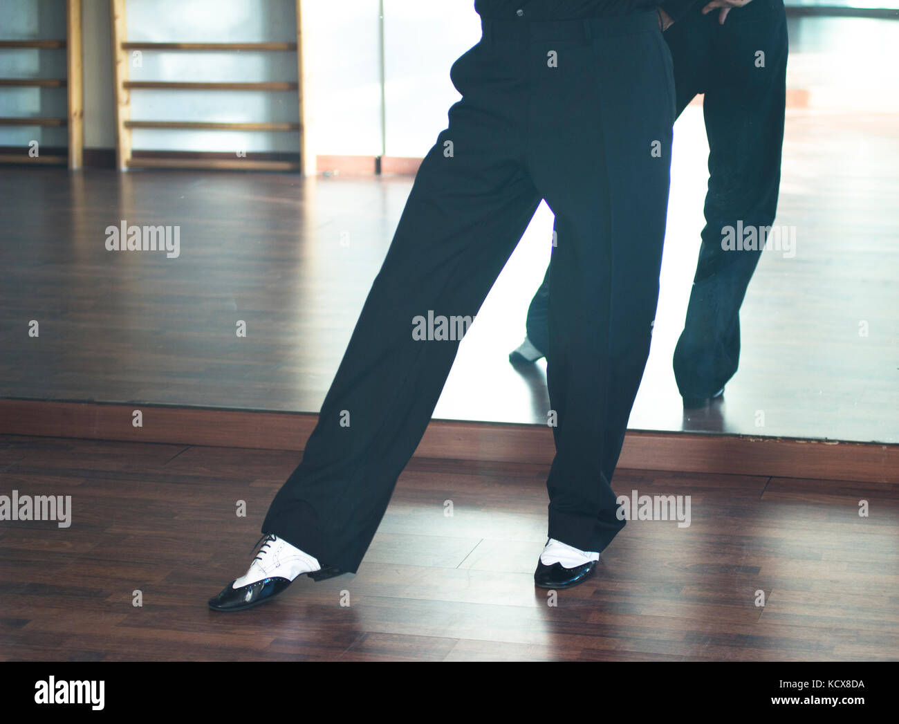 Ballroom dance male dancer and teacher in studio school dancing in ...