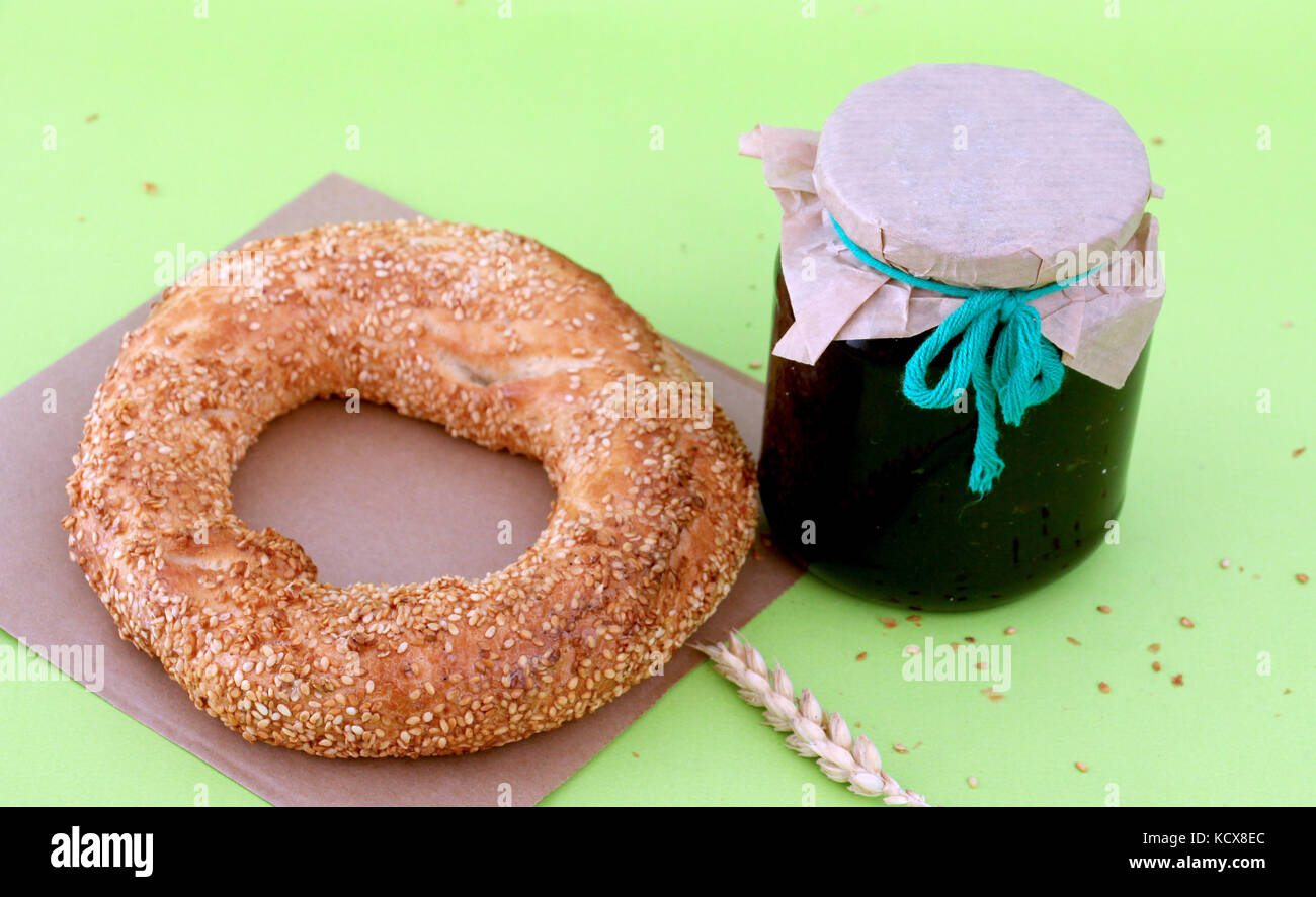 picture of a Turkish bagel simit and cherry jam in jar Stock Photo - Alamy