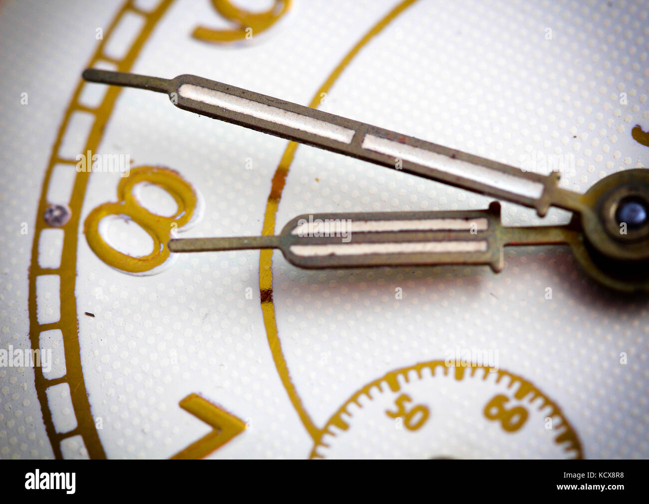 Closeup of hands on clock face Stock Photo - Alamy