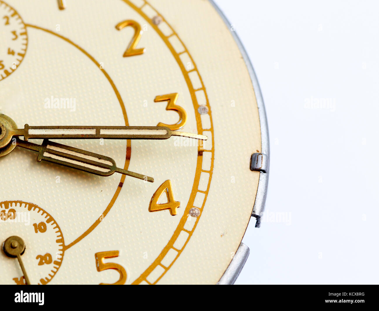 picture of a Closeup of hands on clock face Stock Photo - Alamy