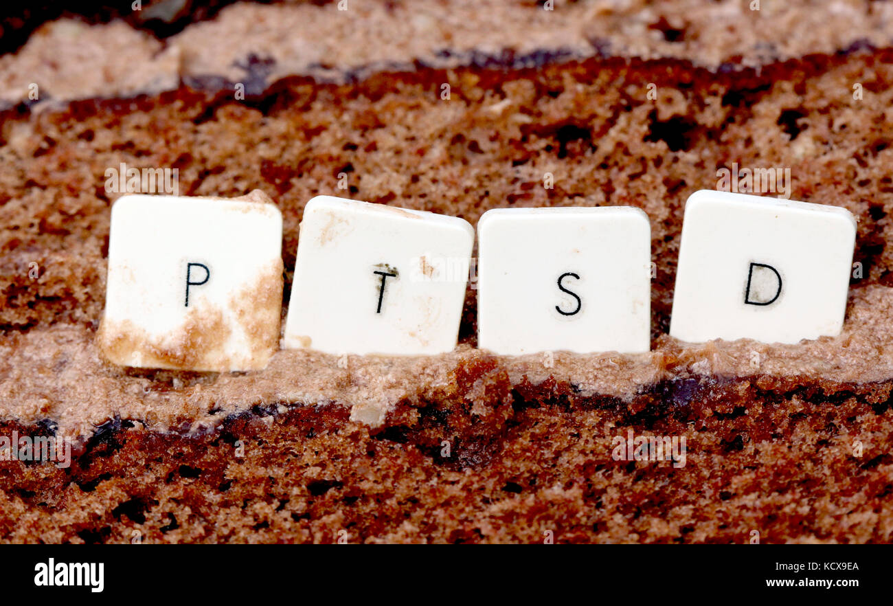 picture of a PTSD keyboard letters on a chocolate cake background Stock ...