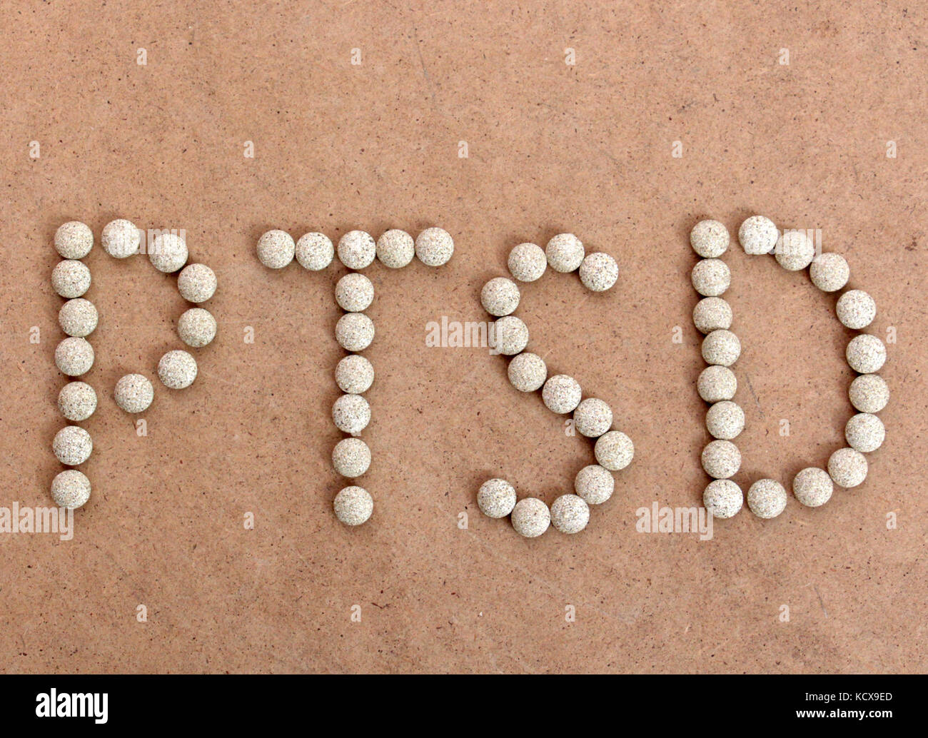 picture of a PTSD text with herbal pills on a wood background Stock ...