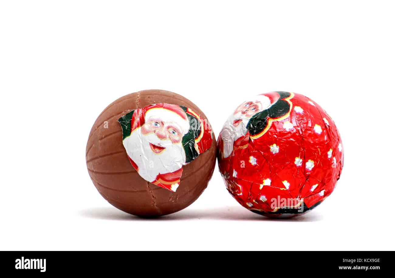 Santa Claus Christmas Chocolate Balls on white background Stock Photo ...
