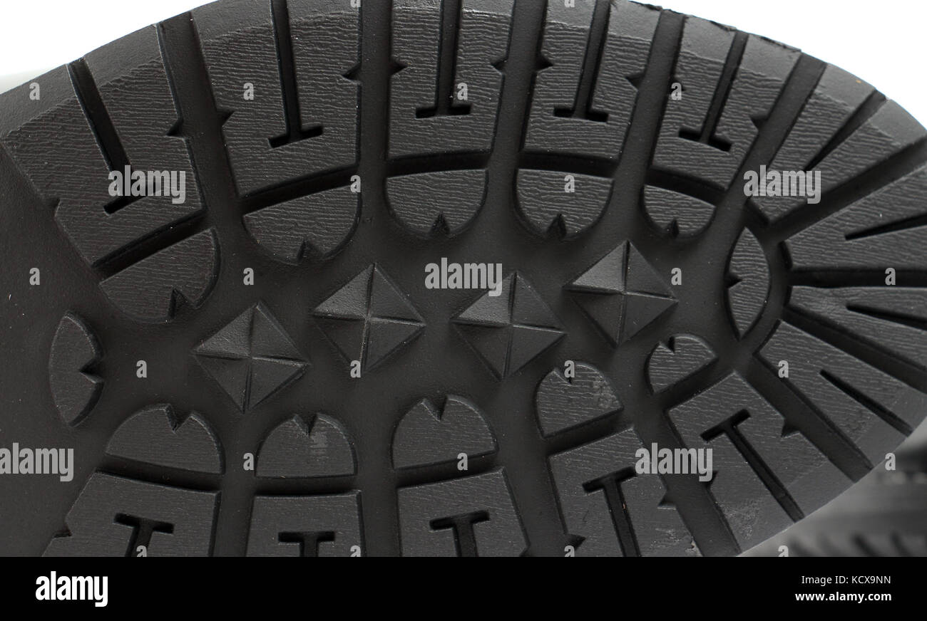 picture of a Bottom of a men's black winter boot, patterns and texture ...