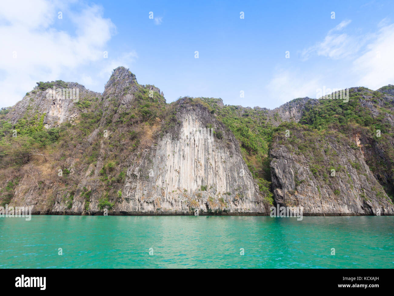 emerald sea and rock Stock Photo - Alamy