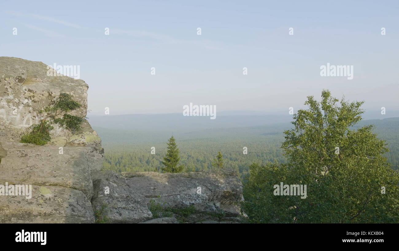 Outdoor natural landscape perspective. Massive rocks and view to the ...